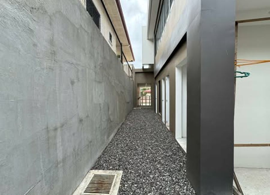 Minimalist Living Redefined: Modernist Home in Sacred Heart Village - Gio